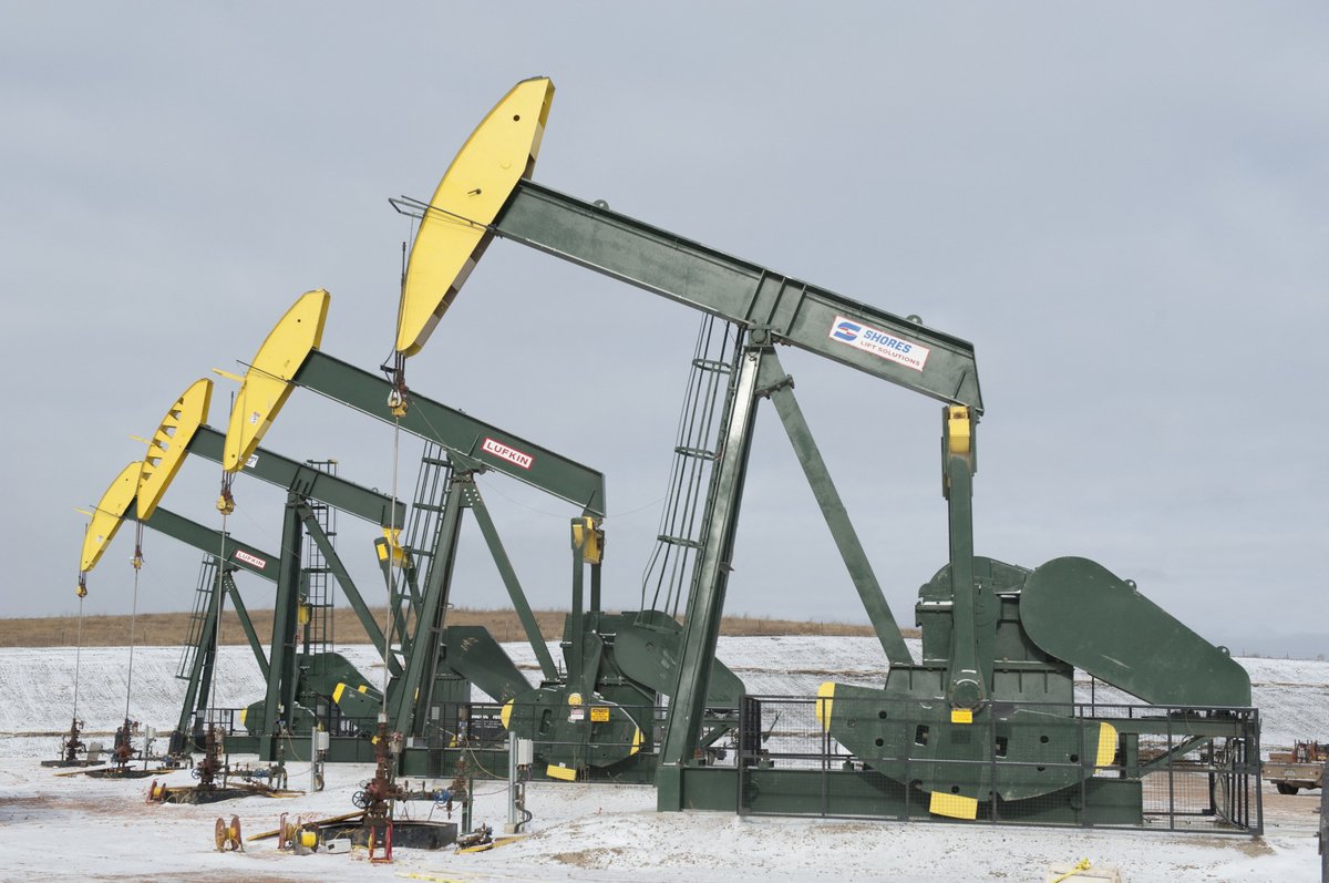 Cash-rich ExxonMobil, Chevron use stock for mega deals amid energy ...